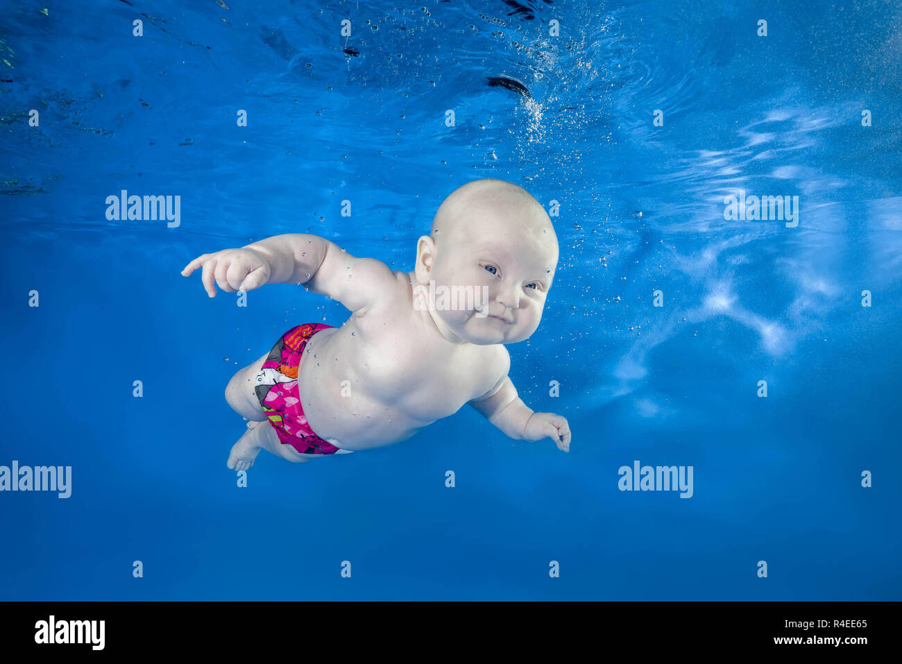 Baby Underwater Blue Background High Resolution Stock Photography and ...