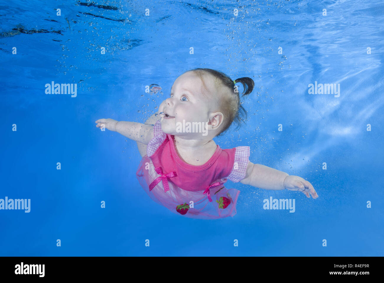 Baby swimming underwater hi-res stock photography and images - Alamy