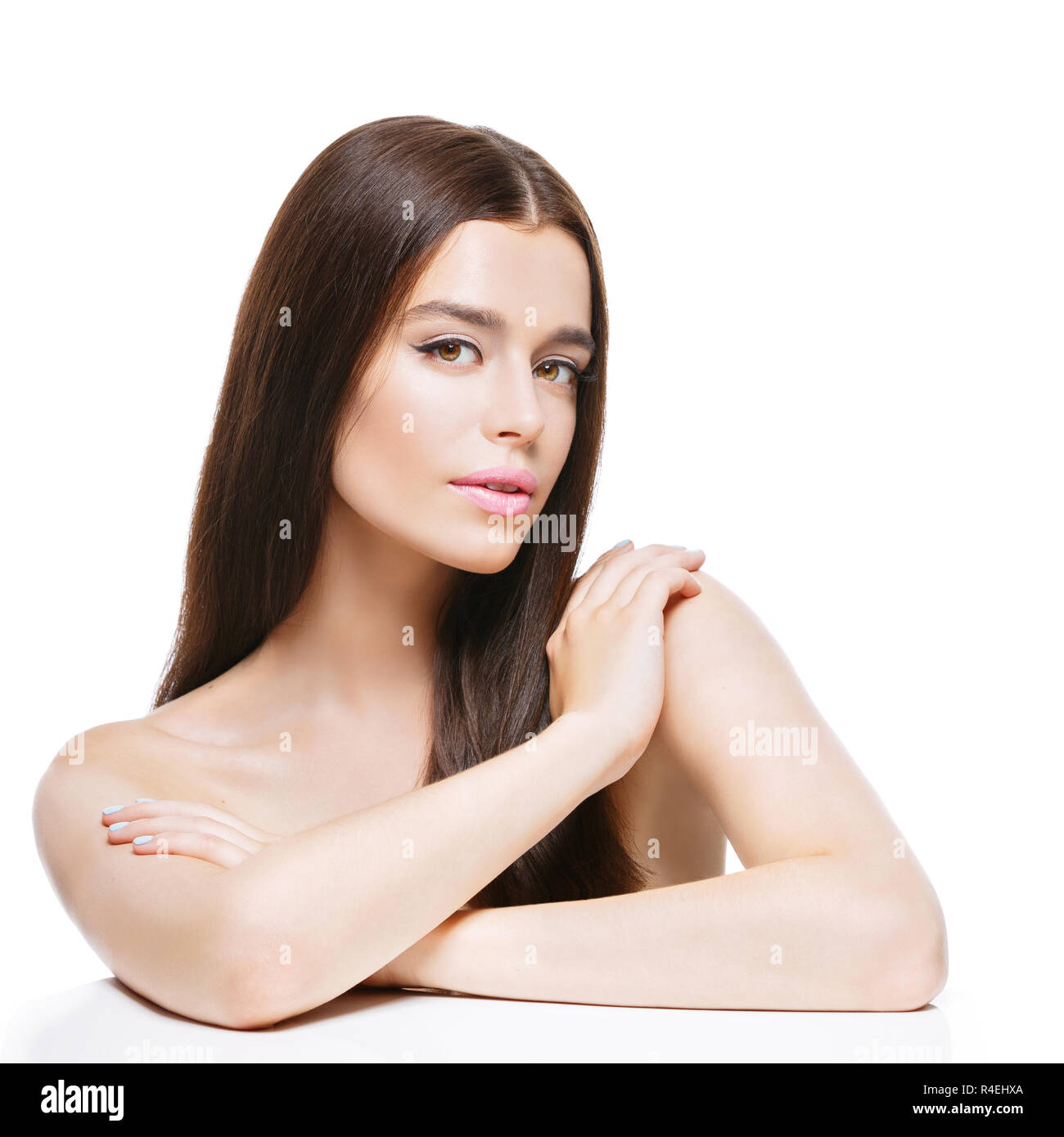 Beautiful girl touching shoulder Stock Photo - Alamy