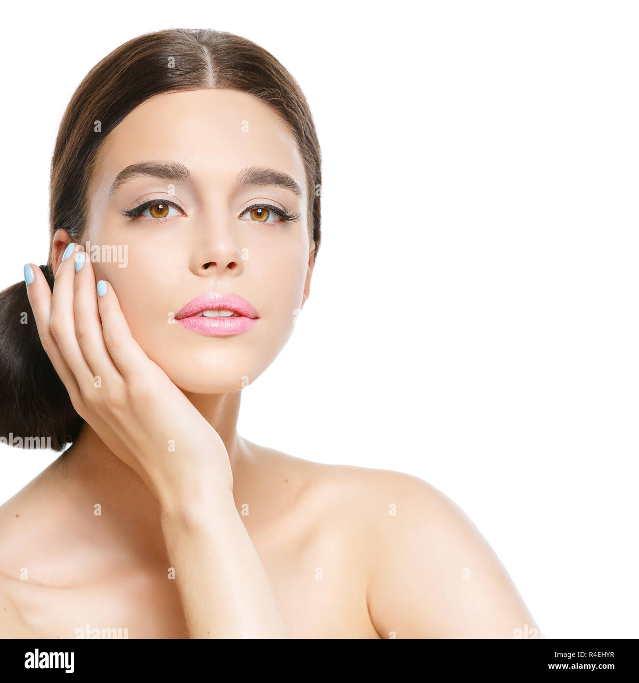 Beautiful girl touching face Stock Photo - Alamy