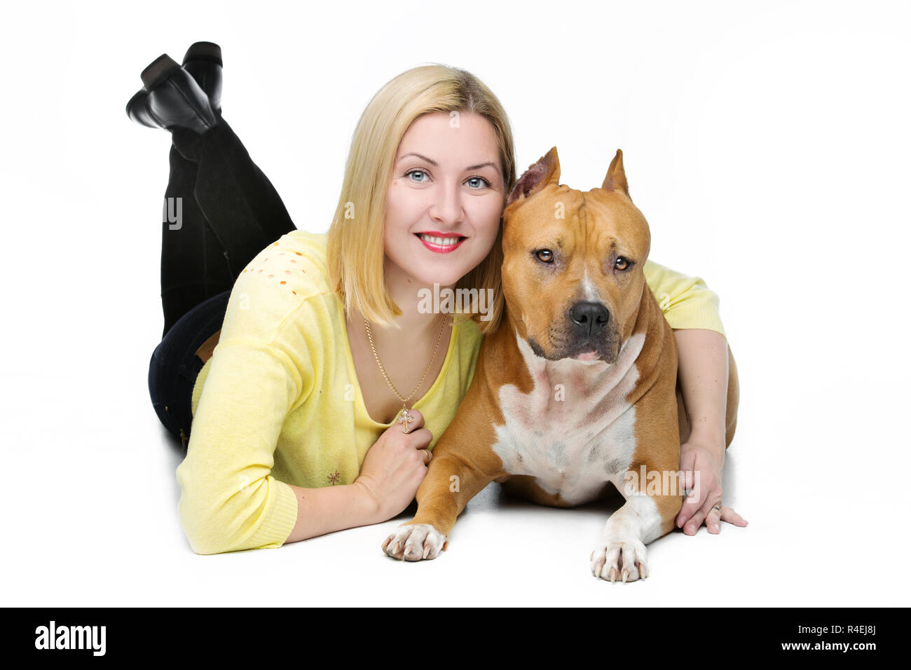 Girl hugging dog Stock Photo - Alamy