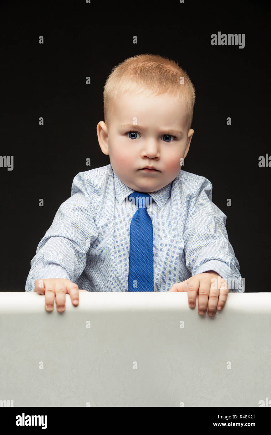 Serious little boy Stock Photo - Alamy