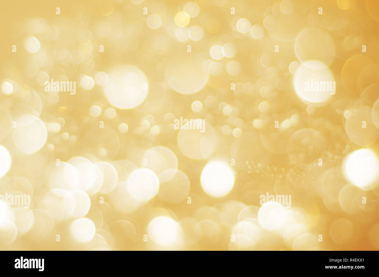 A sparkling bokeh background blur in gold and white Stock Photo - Alamy