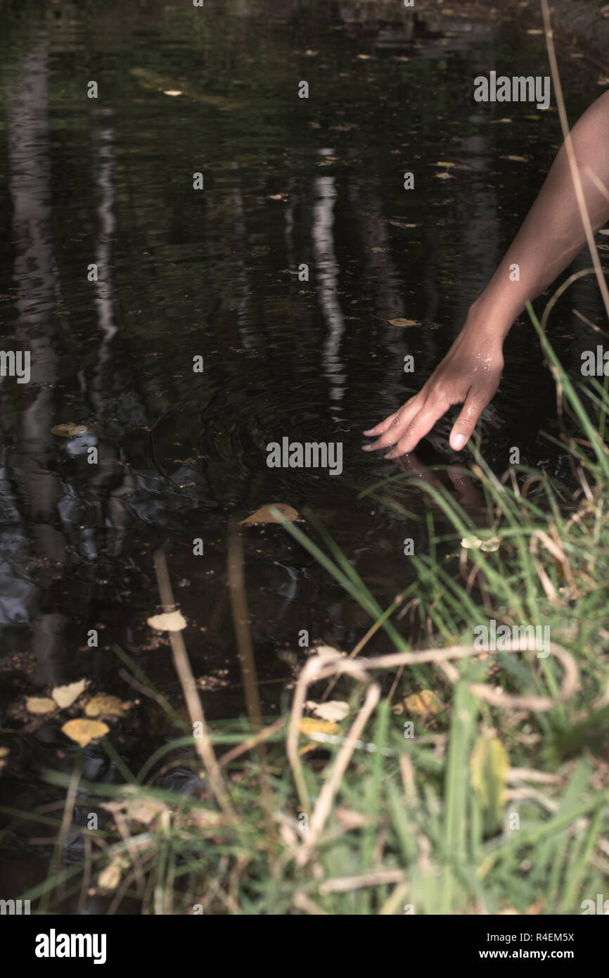 Mature woman touching hand hi-res stock photography and images - Alamy