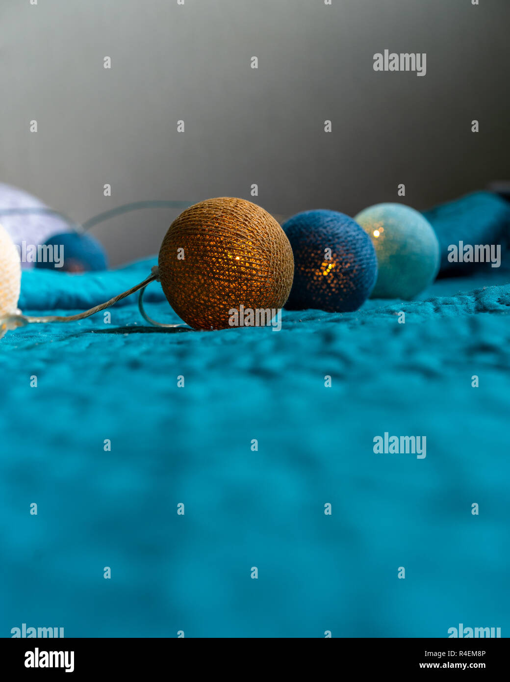 Christmas Decoration Light Balls Laying on Mattress with Turquoise ...