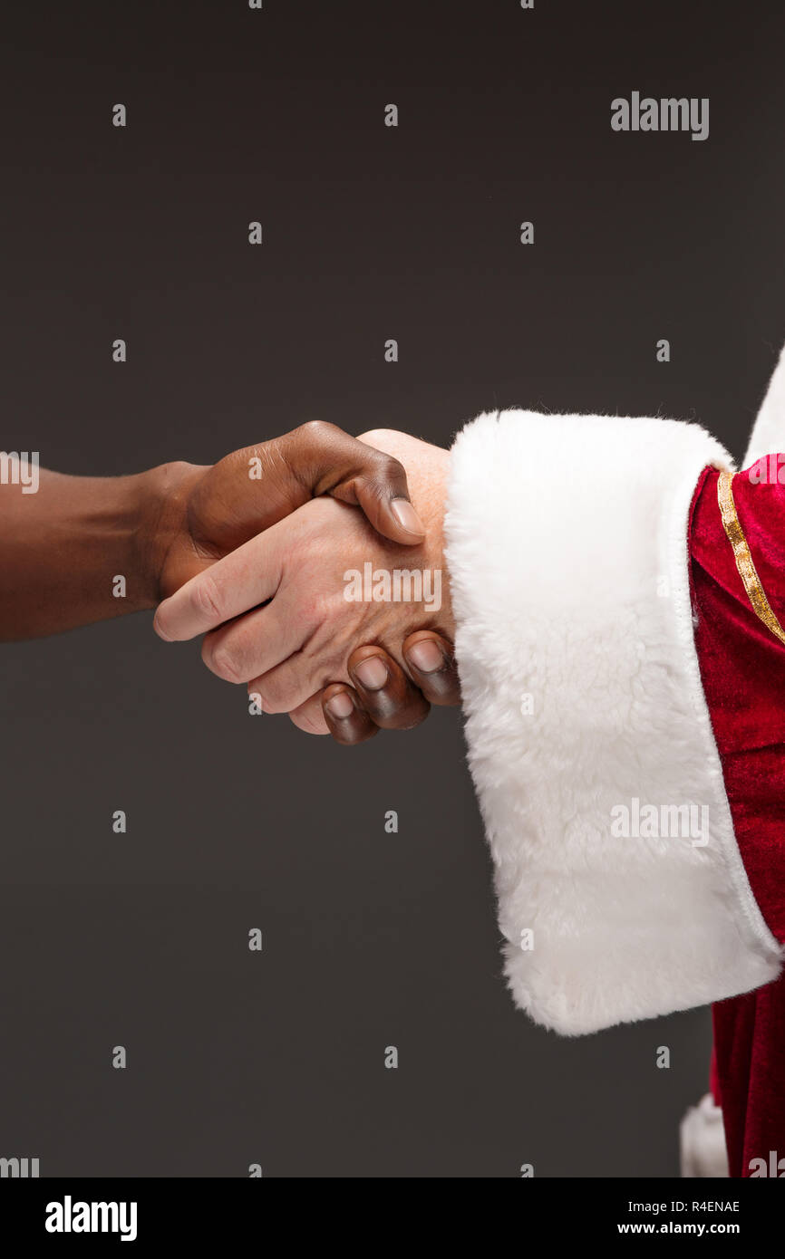 Traditional african handshake hi-res stock photography and images - Alamy