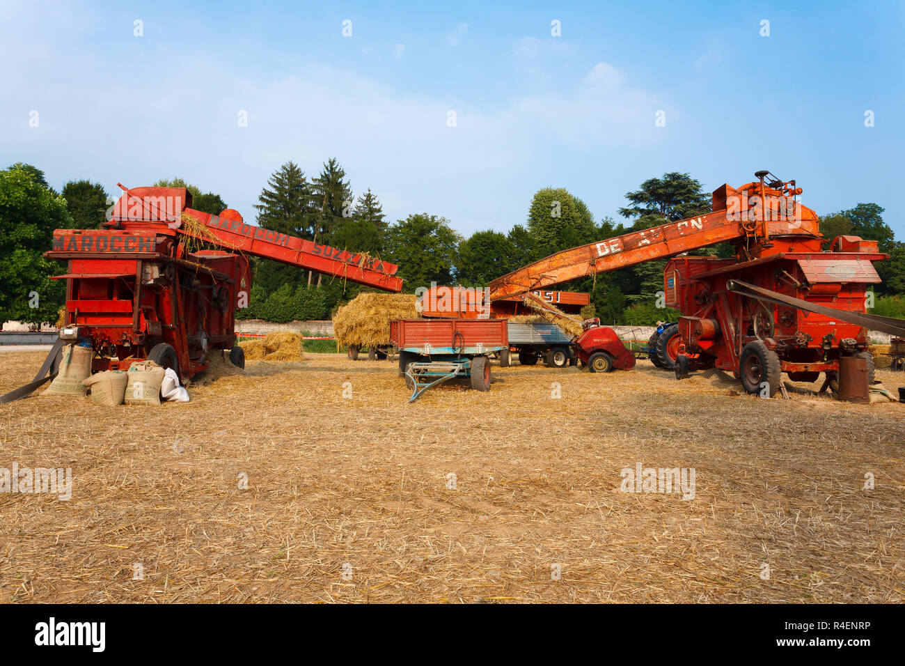 Couple of straw balers Stock Photo - Alamy