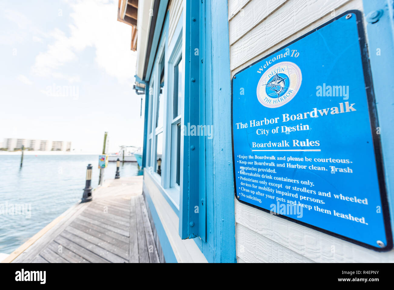 Destin, USA - April 24, 2018: Closeup of city town village blue sign ...