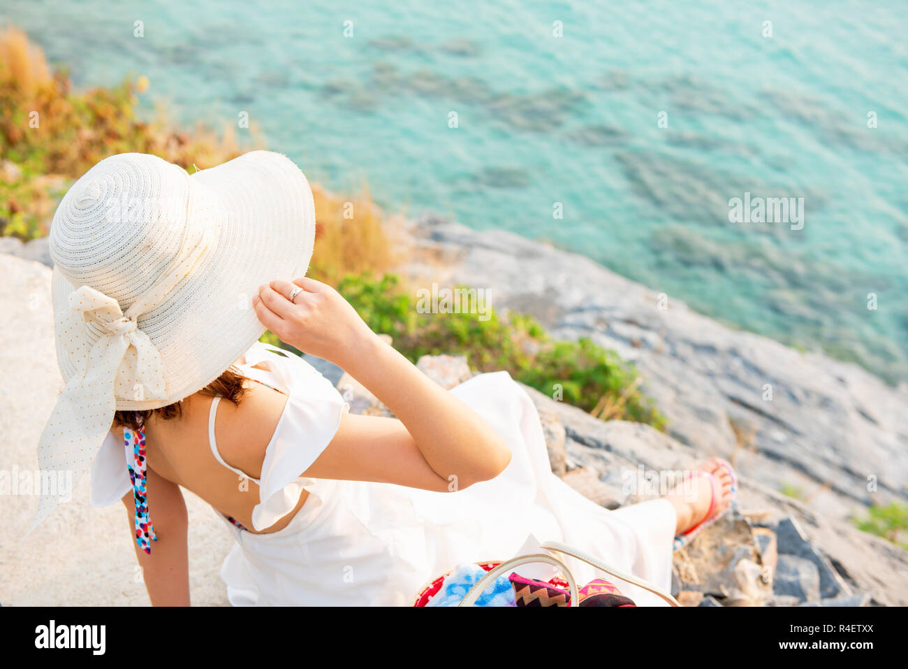 Beautiful women travel alone at the beach on Summer. Sea and sky on ...