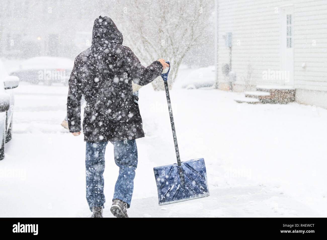 Man walking in heavy snowstorm hi-res stock photography and images - Alamy