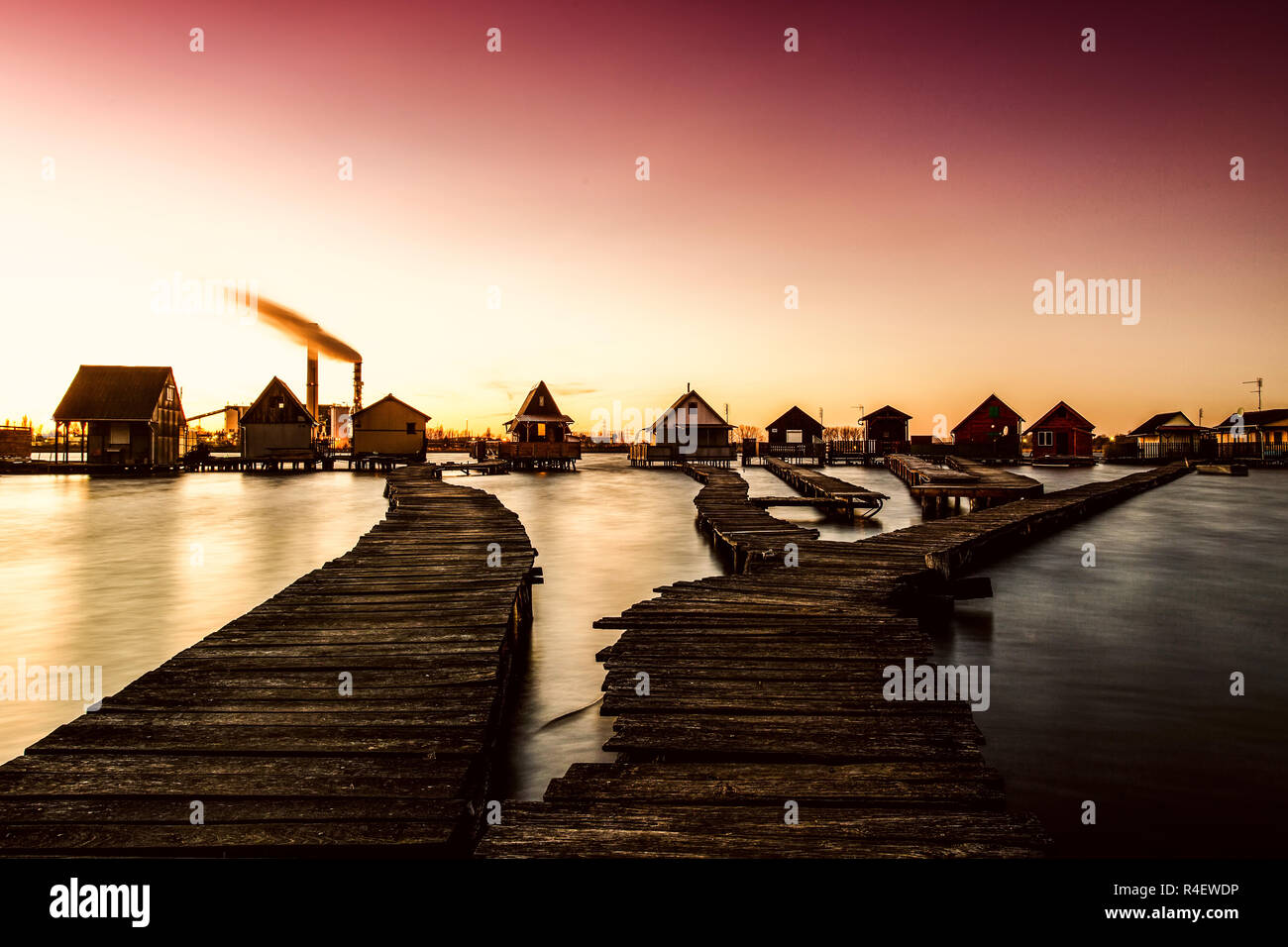 Sunset lake Bokod with pier Stock Photo - Alamy