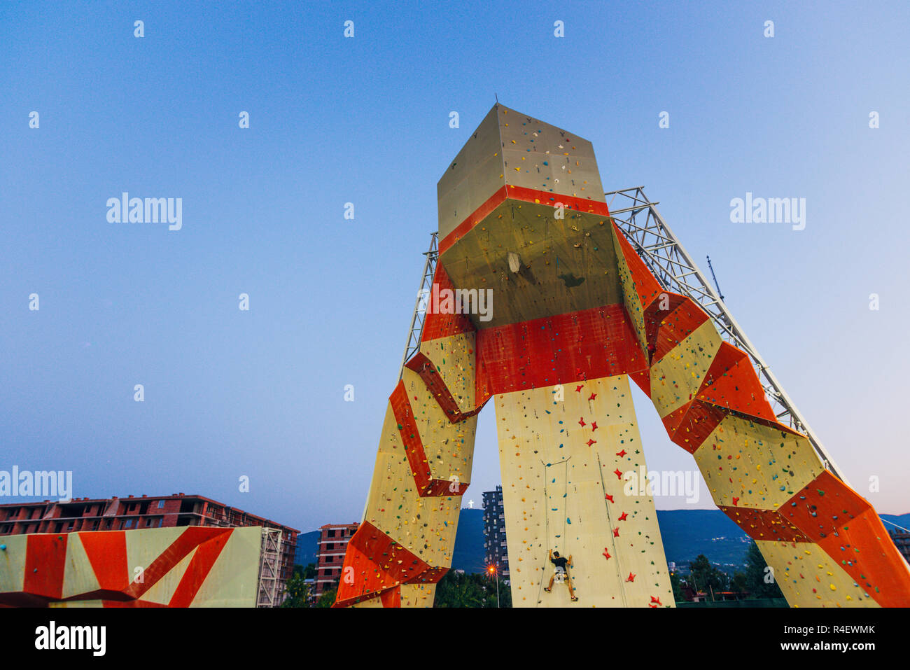 Young man climbing wall rock an extreme sport Stock Photo - Alamy
