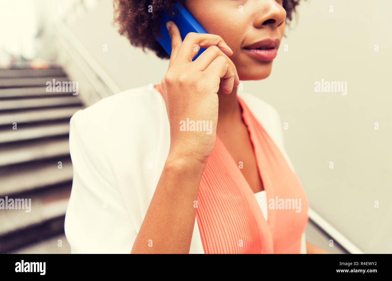 Woman calling up stairs hi-res stock photography and images - Alamy