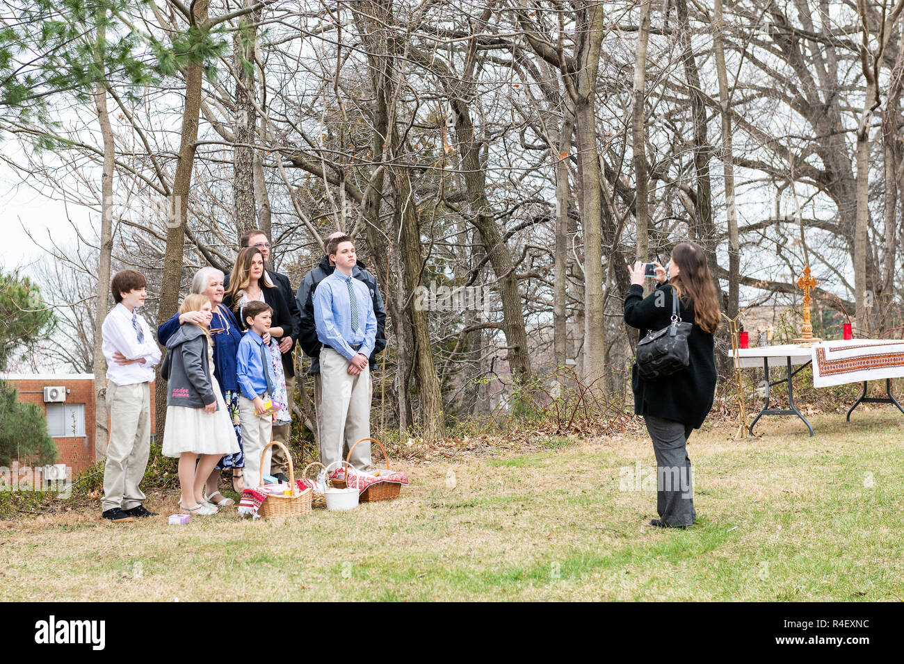 Women photographing children outside hi-res stock photography and ...