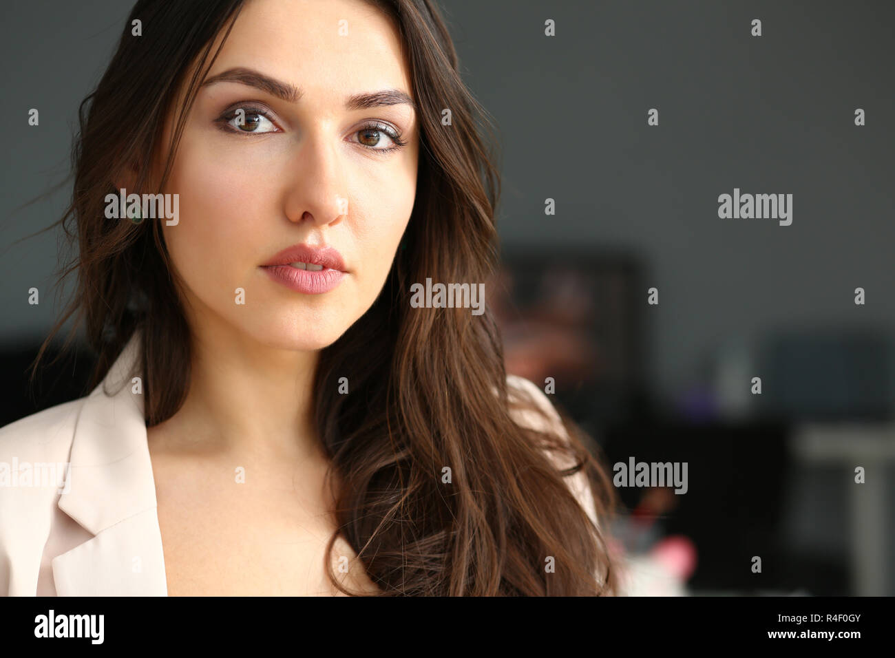 Beautiful smiling girl at workplace look in camera Stock Photo - Alamy