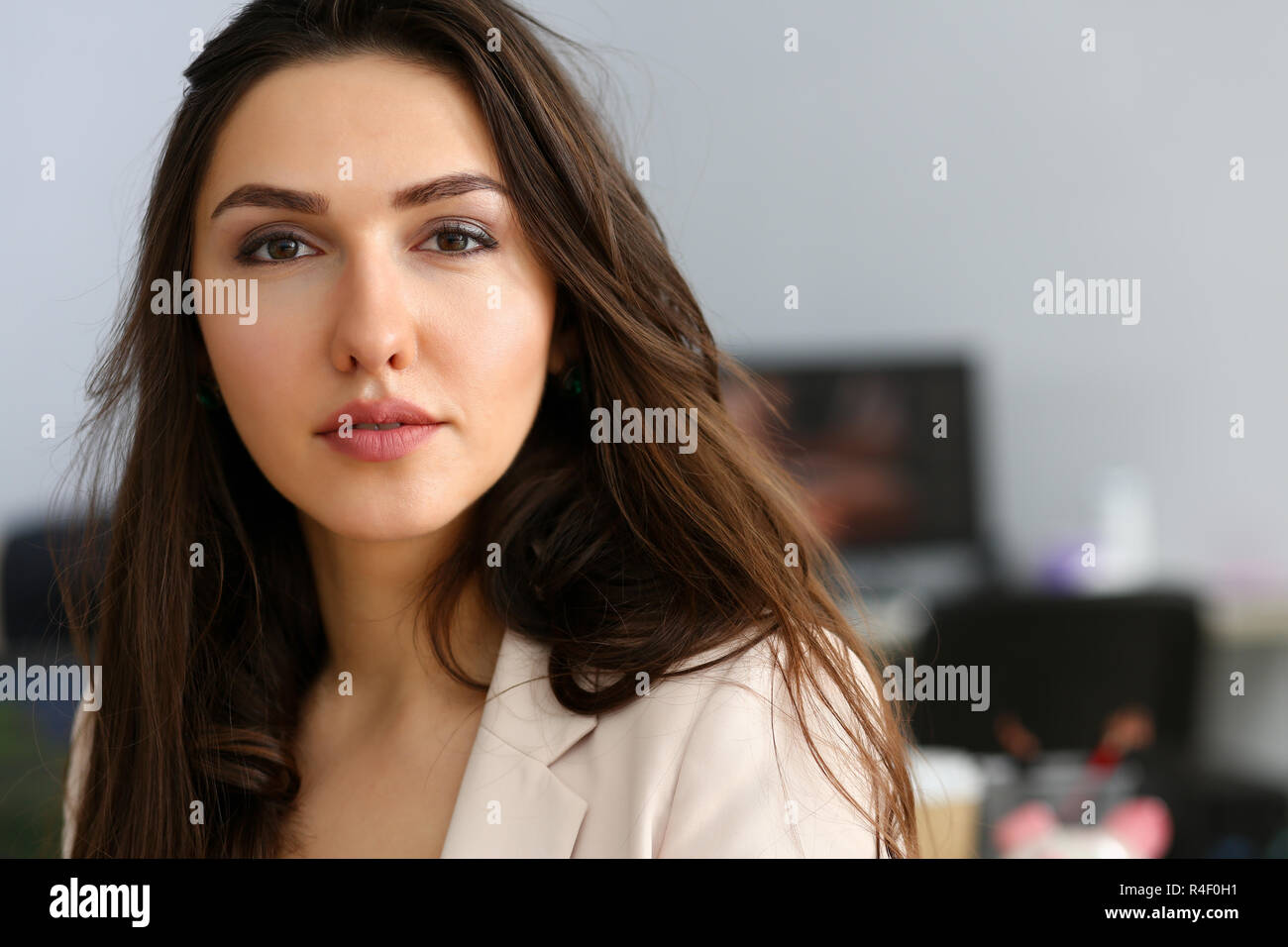 Beautiful smiling girl at workplace look in camera Stock Photo - Alamy