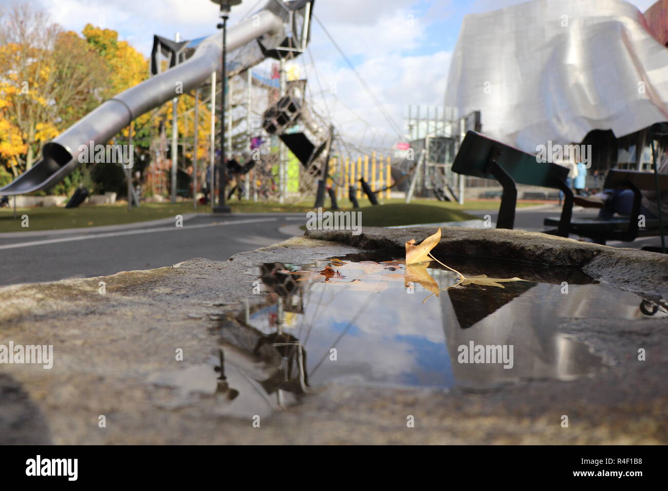 Slide playground rain hi-res stock photography and images - Alamy