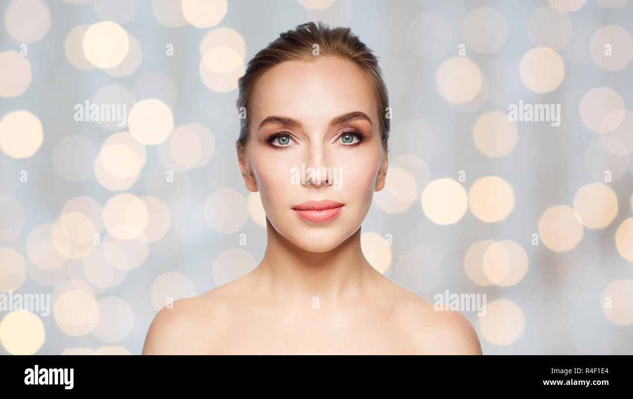 beautiful young woman face over white background Stock Photo - Alamy