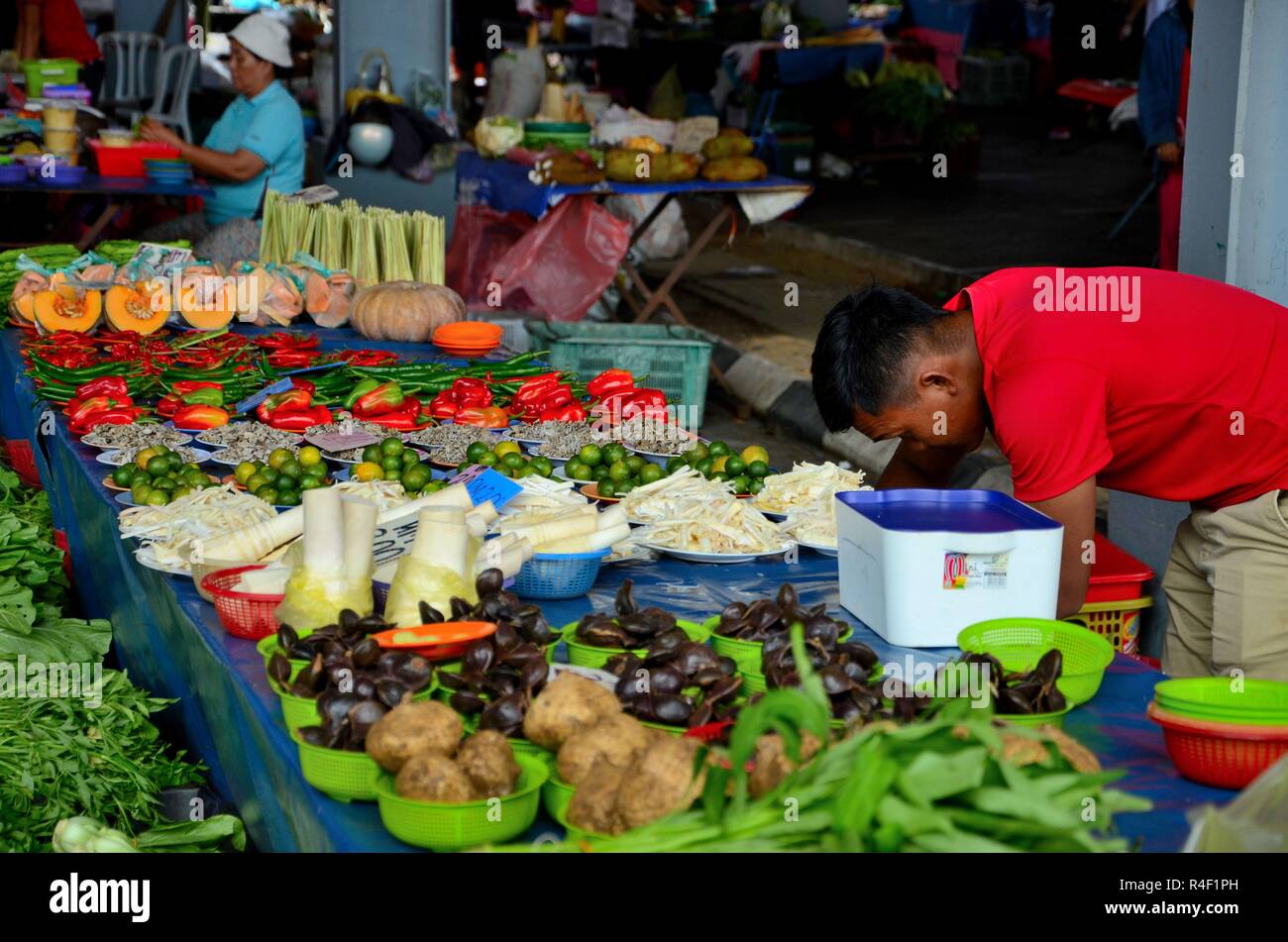 Tables stalls selling fresh street food & fruit at outdoor section of ...