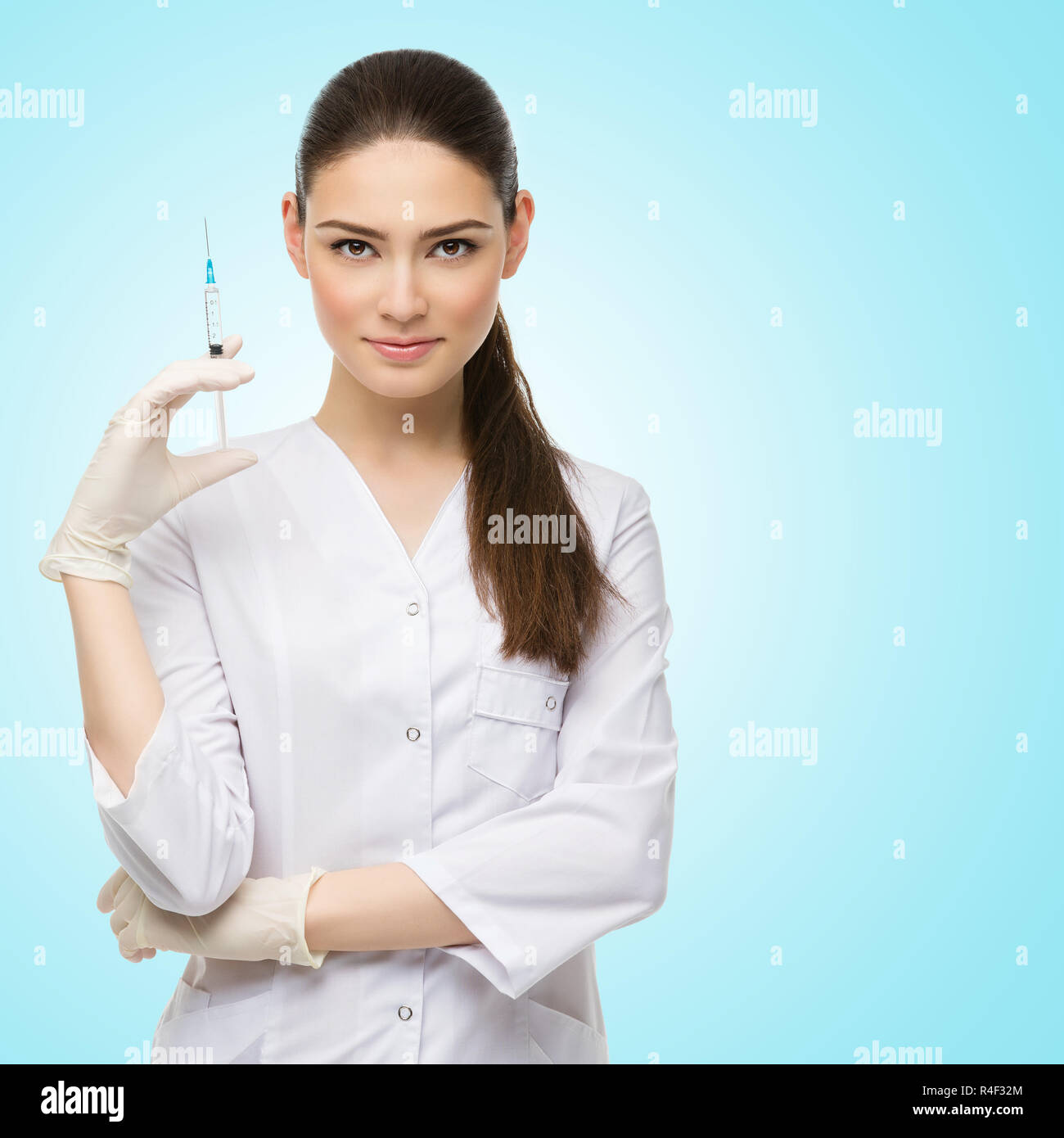 Doctor with syringe Stock Photo - Alamy
