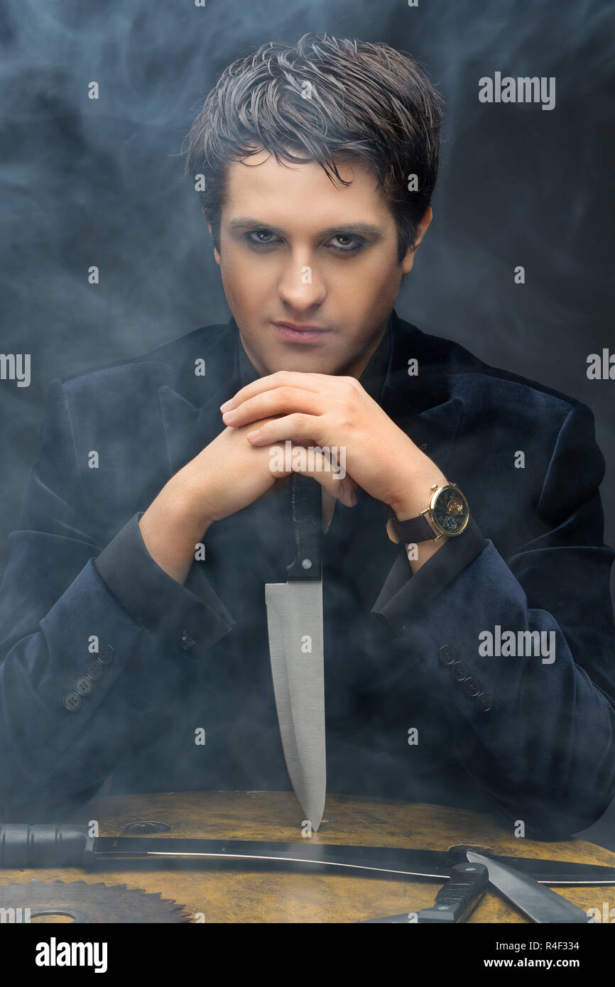 Man magician table hi-res stock photography and images - Alamy