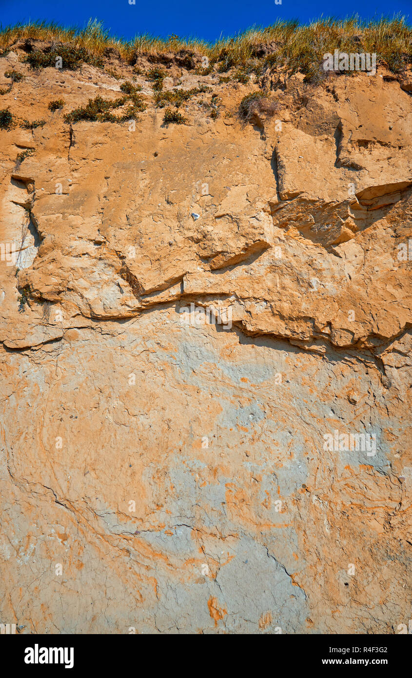 Detail of the sandy Baltic Sea cliff with sky in the background Stock ...