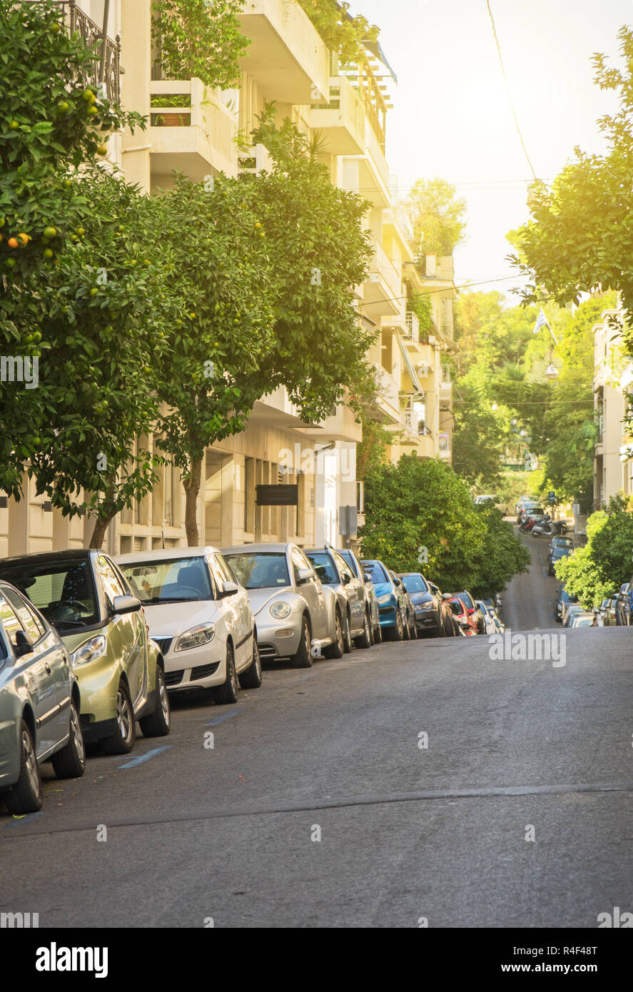 Street sidewalk row parked cars hi-res stock photography and images - Alamy