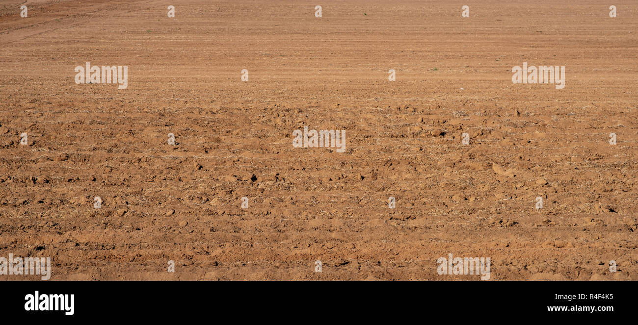 Plowed fields, brown dirt Stock Photo - Alamy