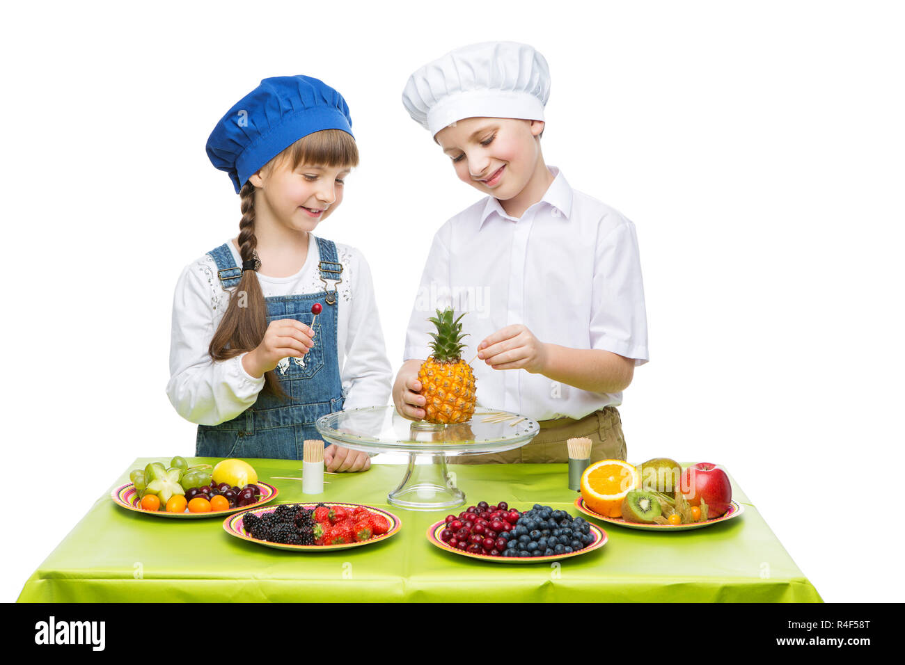 Children making fruit snacks Stock Photo - Alamy