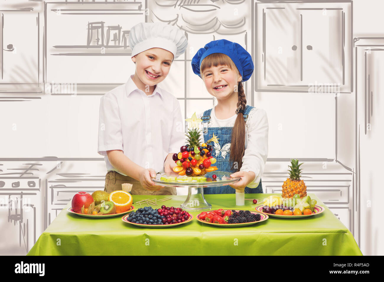 Children making fruit snacks Stock Photo - Alamy