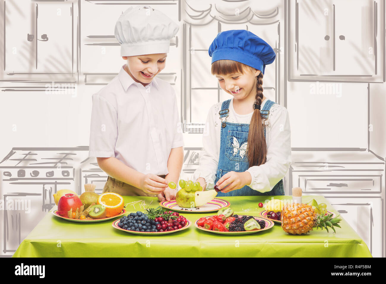 Children making fruit snacks Stock Photo - Alamy