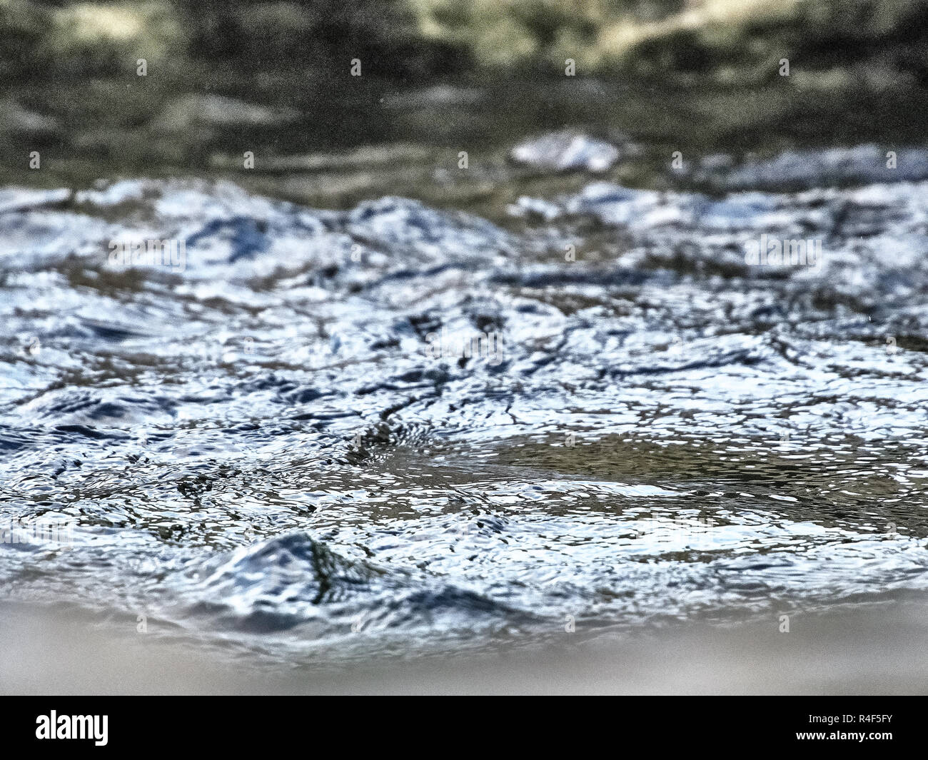 Shot of waves seen from a pool edge Stock Photo - Alamy