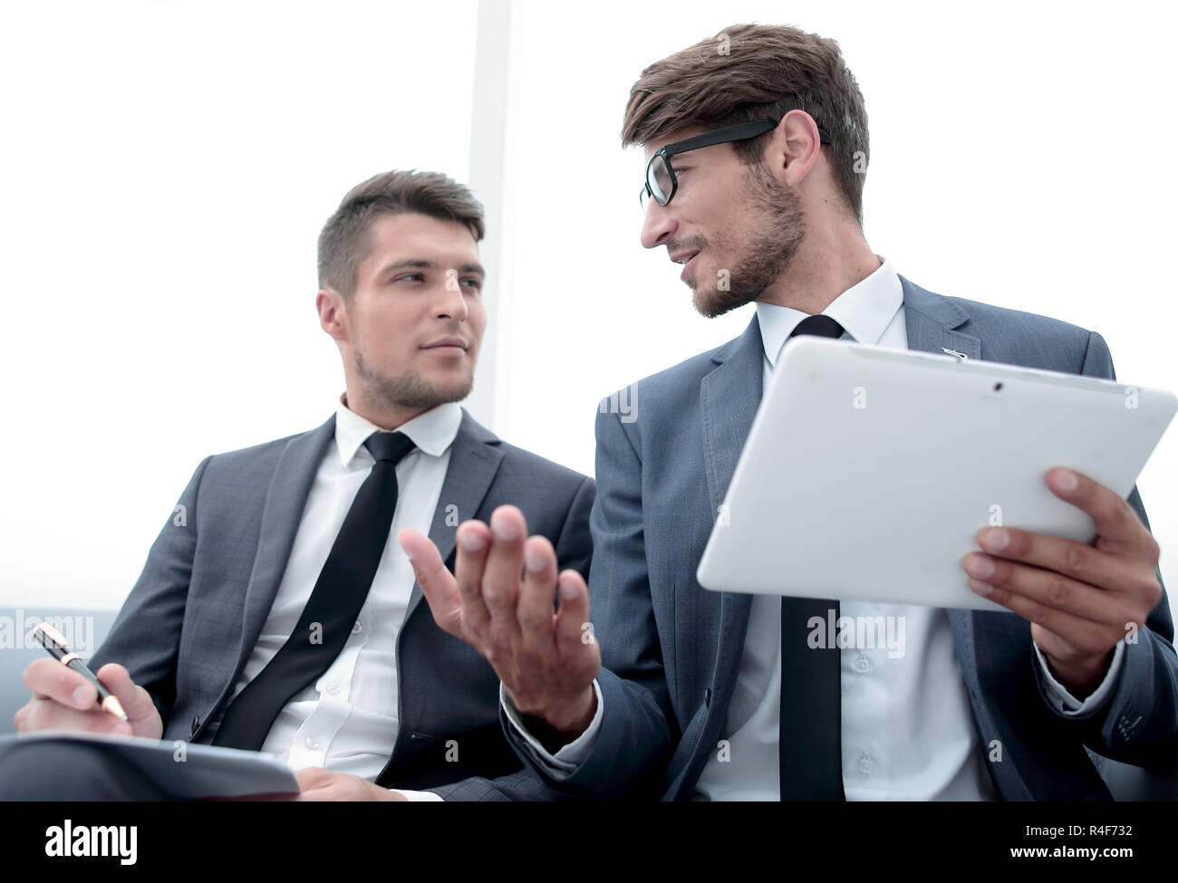 men talking in the office during a break Stock Photo - Alamy