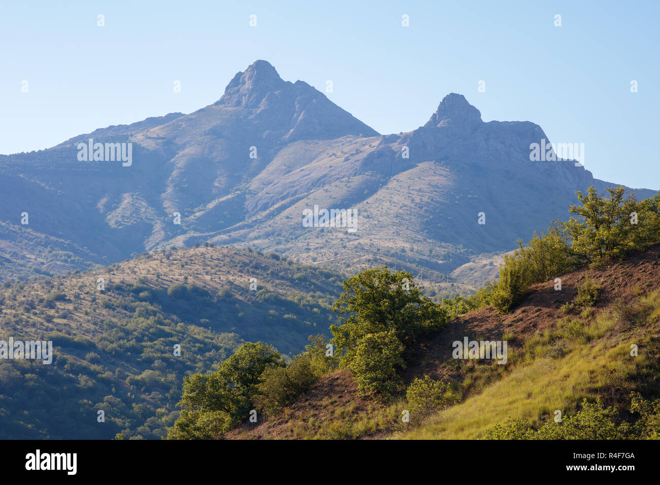 summer mountain landscape. foot path through hill side to the mountain ...