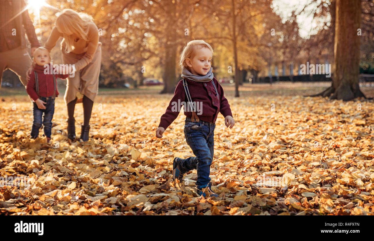 Cheerful family enjoying great, autumnal weather Stock Photo - Alamy