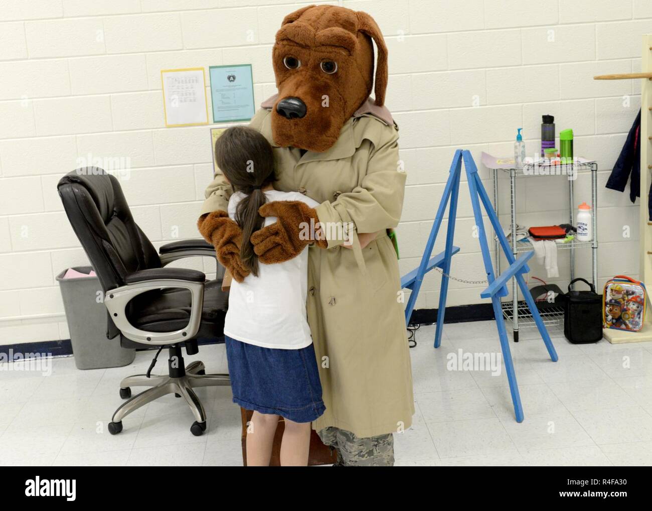 Scruff McGruff, the crime dog, gives hugs and high fives to children at ...