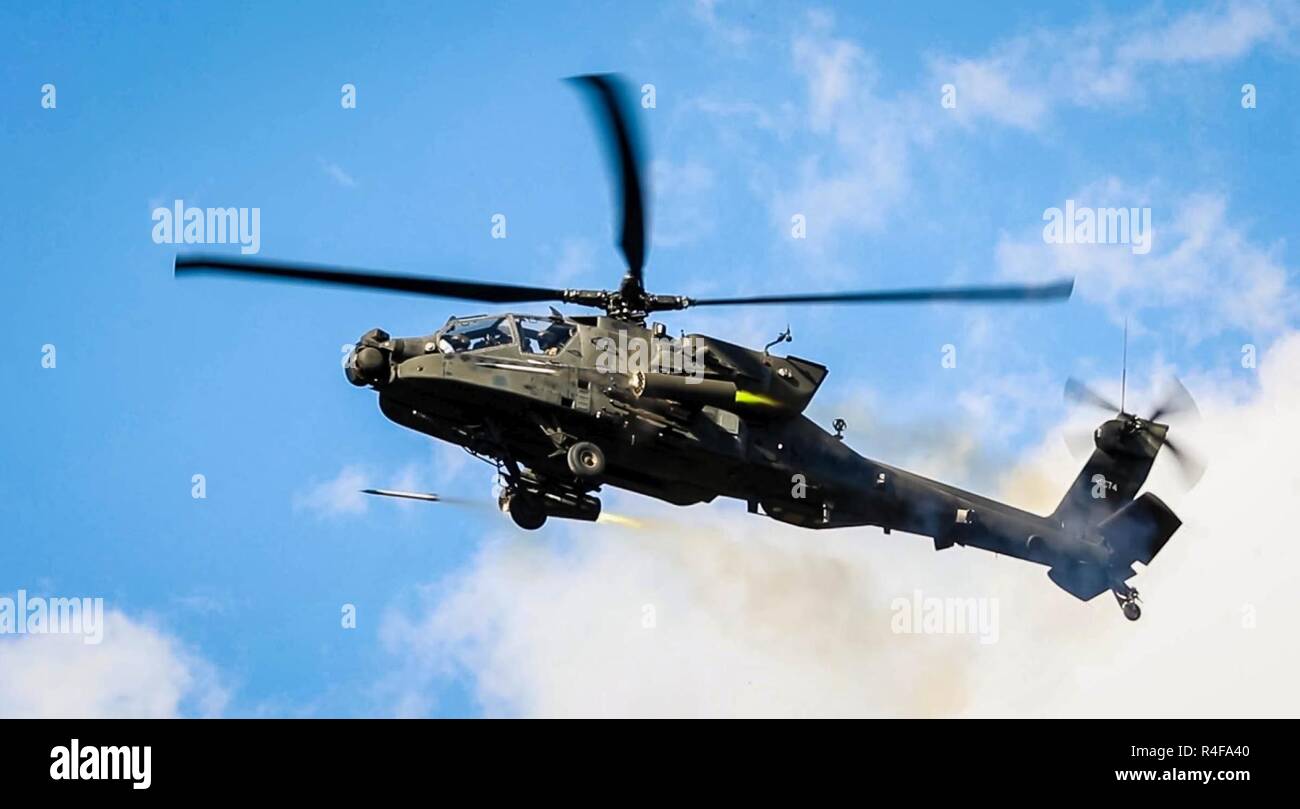 A rocket is launched as a second rocket prepares to deploy from an AH ...