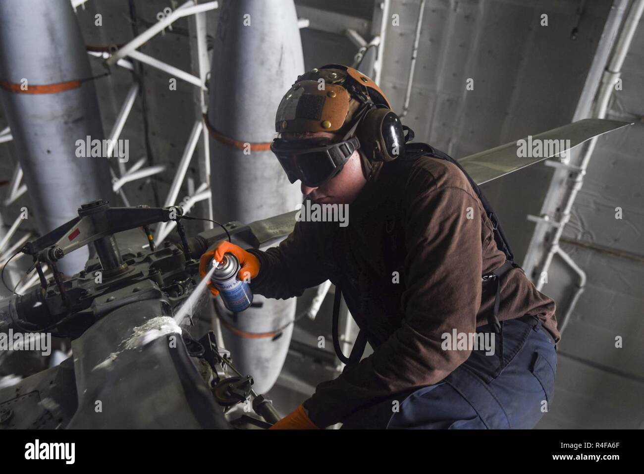 ARABIAN GULF (Oct. 25, 2016) Seaman Alex Spishak-Mehalich, cleans the ...