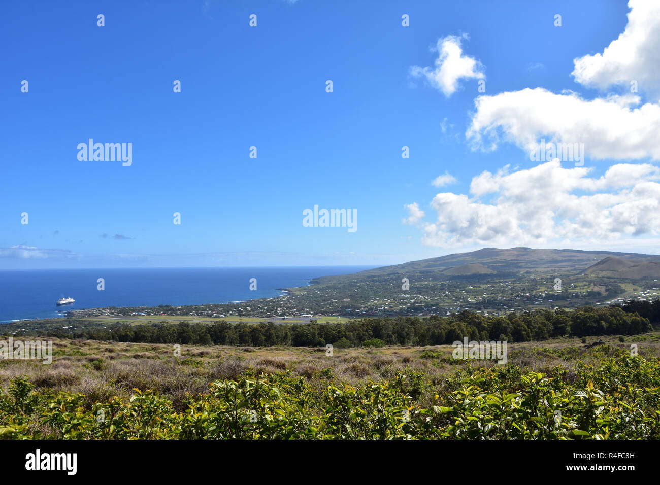 View of Hanga Roa, Easter Island from the west. A cruise ship is ...