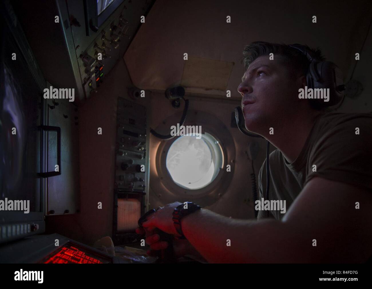 U.S. Naval Aircrewman (Operator) 3rd Class Ryan Wheaton, assigned to ...