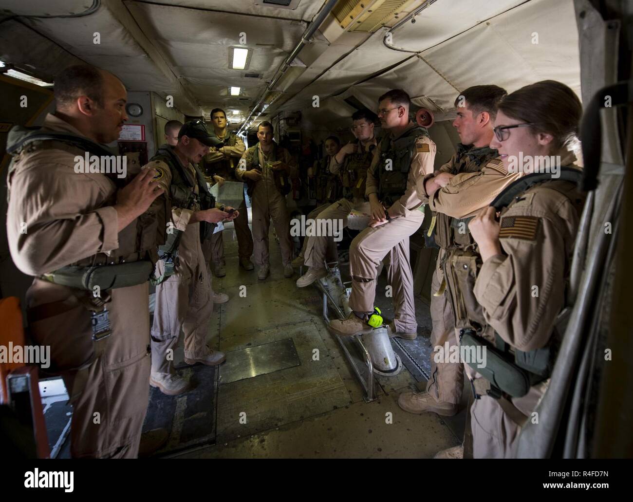 U.S. Naval aircrew assigned to Patrol Squadron FORTY-SIX (VP-46), hold ...