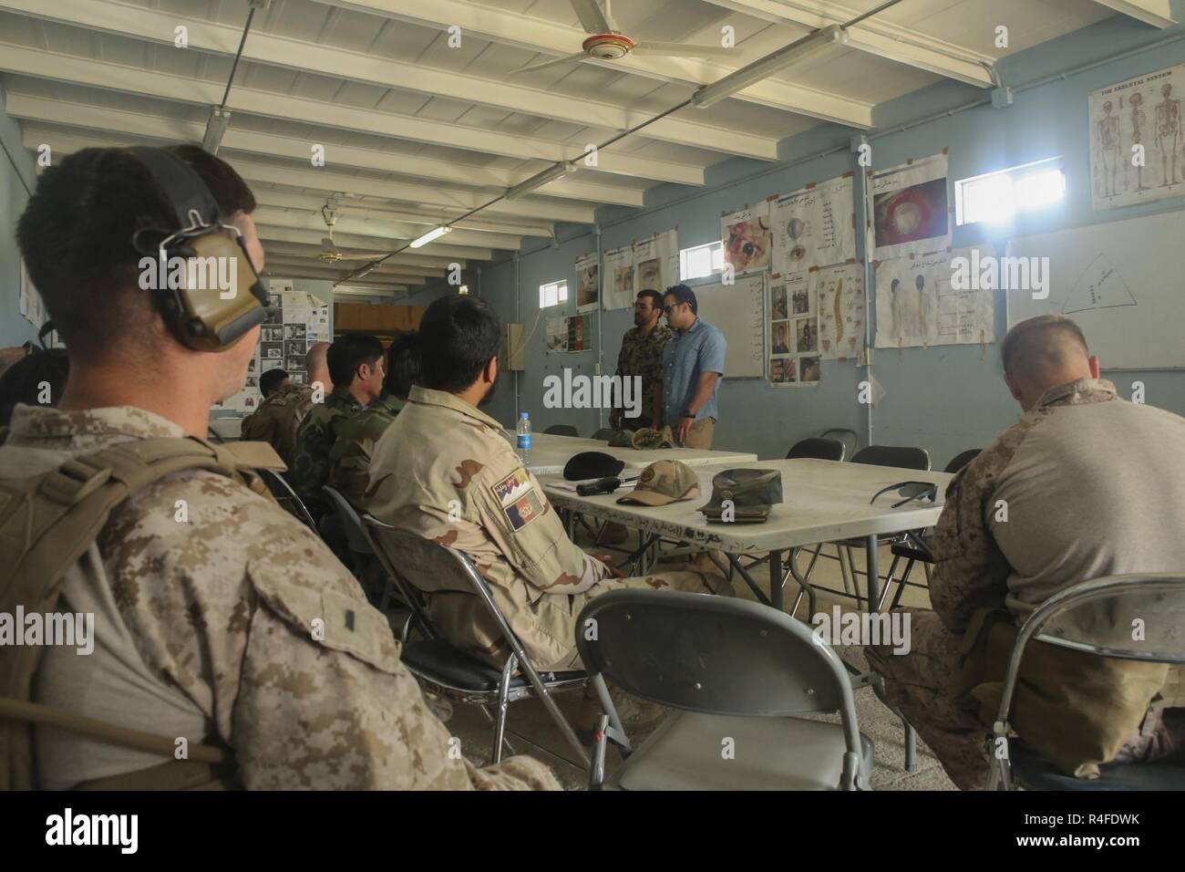 An Afghan National Army soldier with the 215th Corps speaks to U.S ...