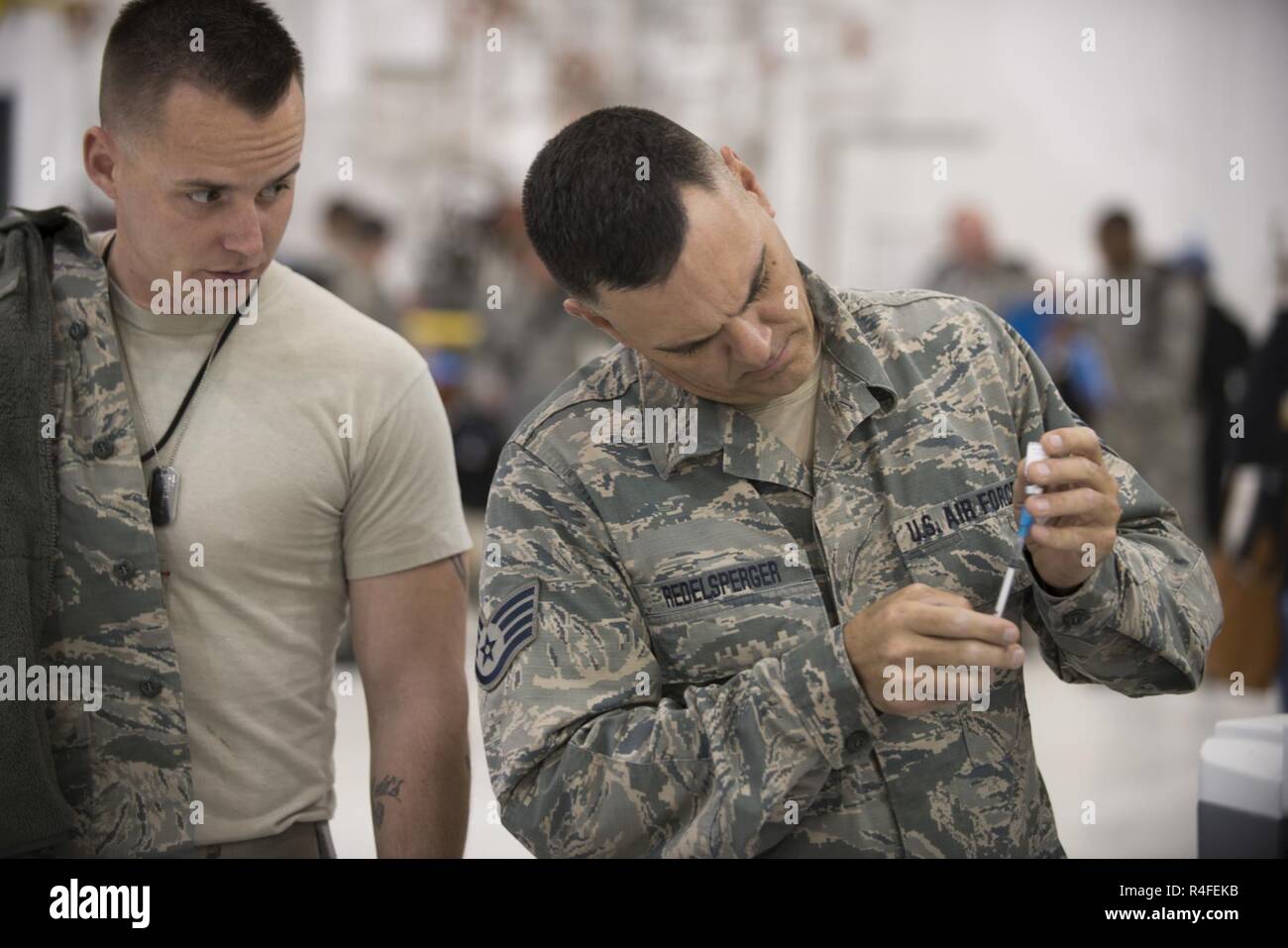 Staff Sgt. Robert Cole (left) from the Colorado Air National Guard’s ...