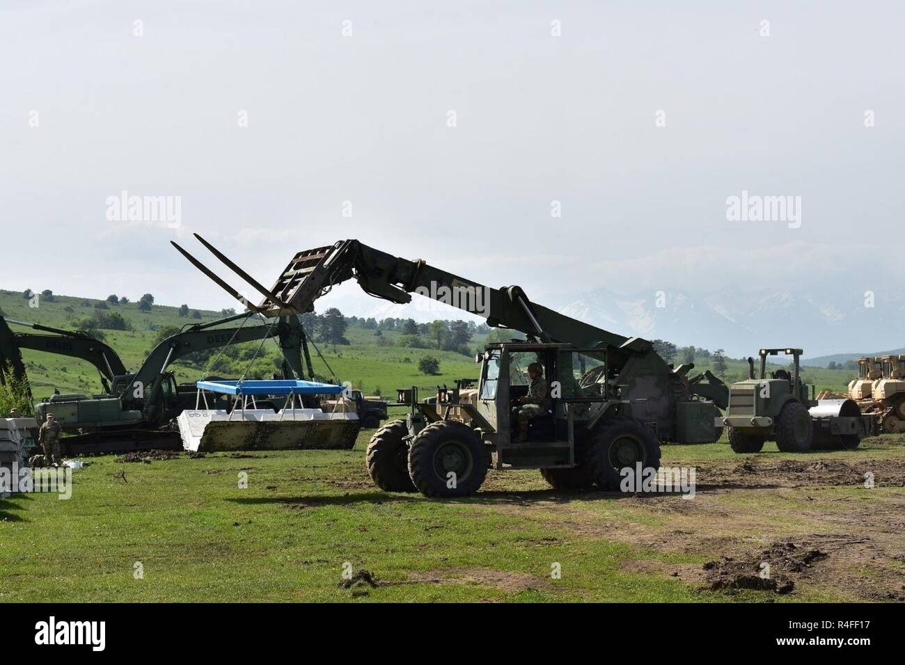 Spc. George Flowers of the 381st Engineer Company, 926th Engineer ...