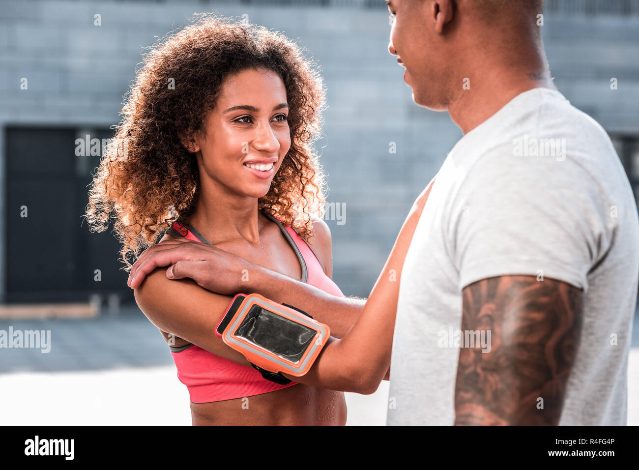Joyful positive people looking at each other Stock Photo - Alamy