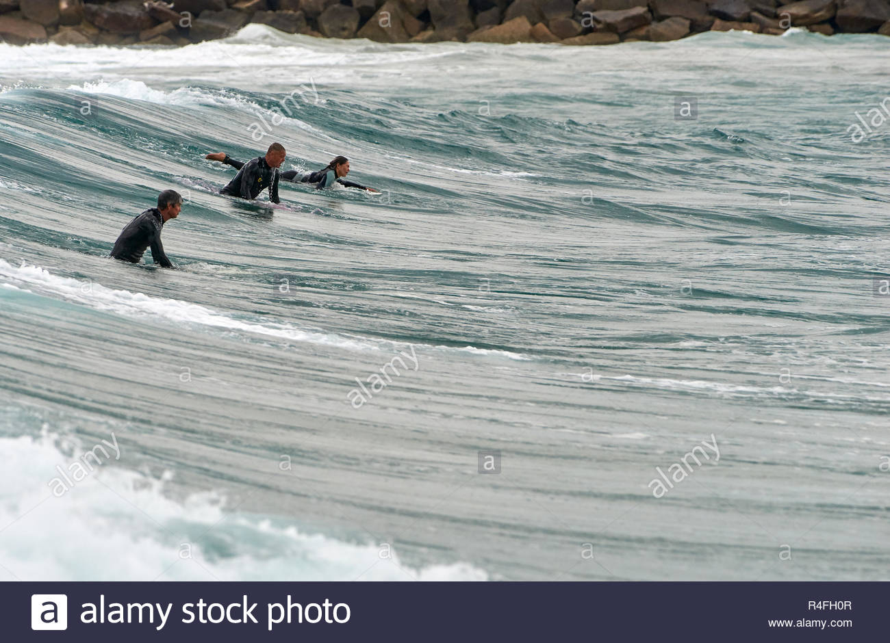 Surfer Diving Under Wave High Resolution Stock Photography and Images ...