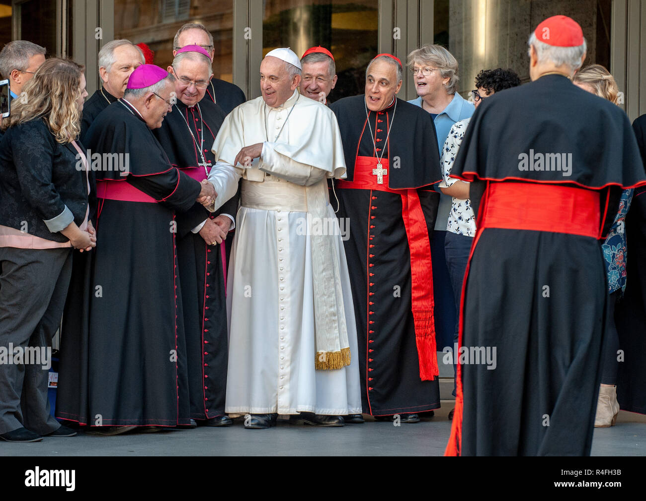 Pope Francis jokes with Msgr. Charles Joseph Chaput as he arrives to ...
