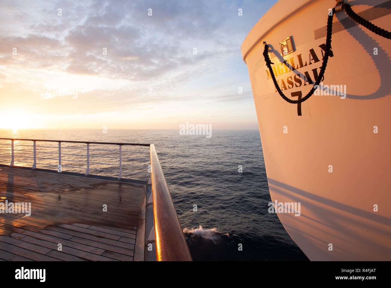 Cruise ship lifeboat at sunset Stock Photo - Alamy