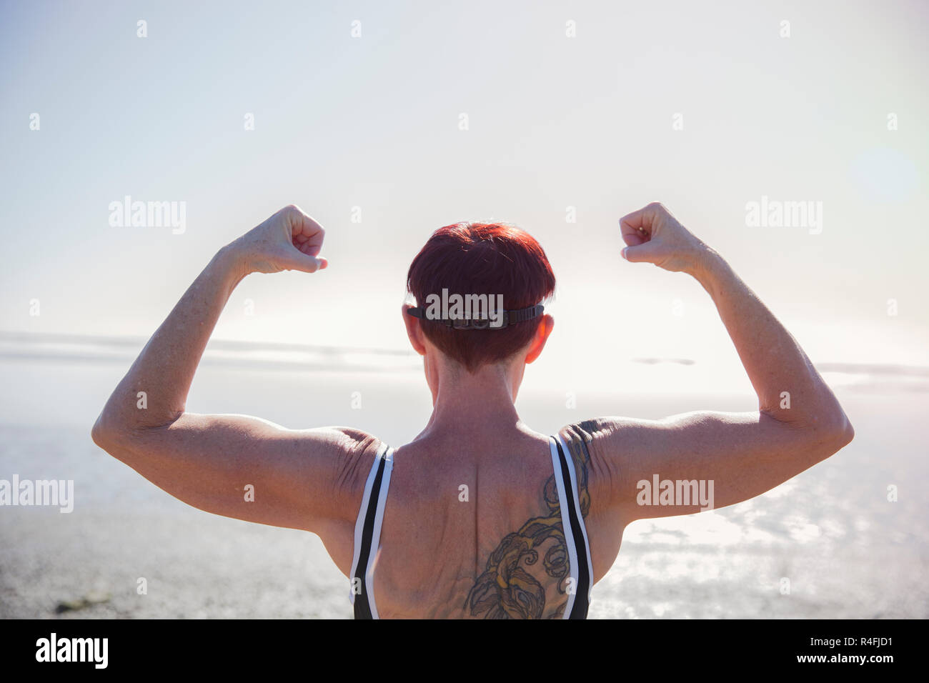 Senior Flexing Muscles Stock Photos & Senior Flexing Muscles Stock ...