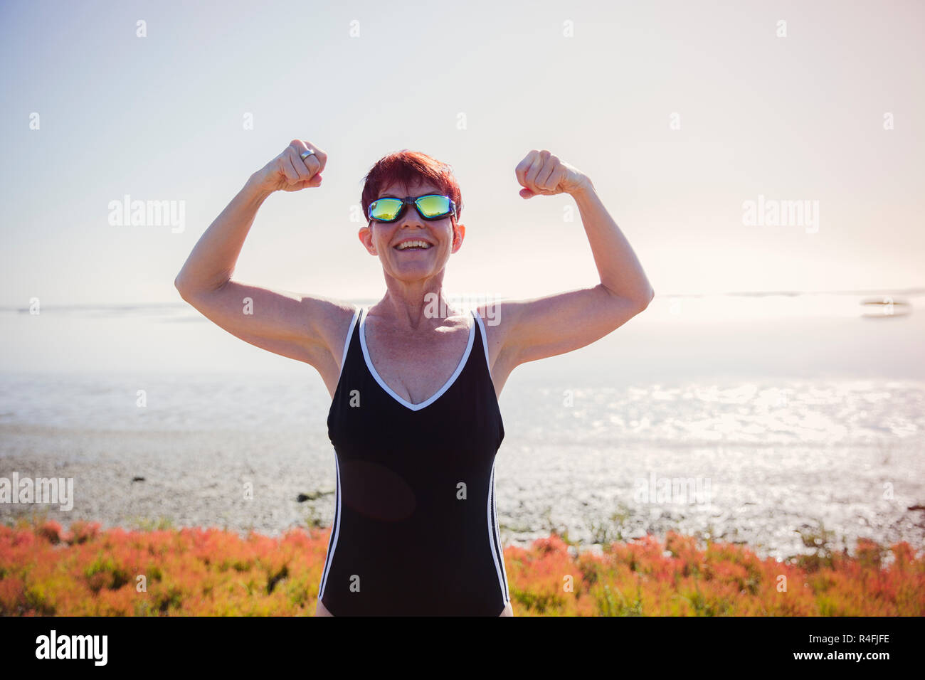 Woman muscles beach hi-res stock photography and images - Alamy